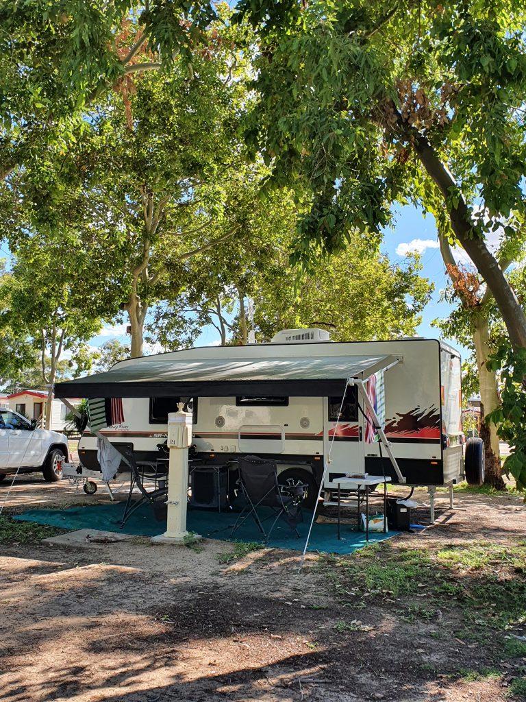Reversing a 21 ft. double axel 2.9-ton caravan in a full caravan park ...
